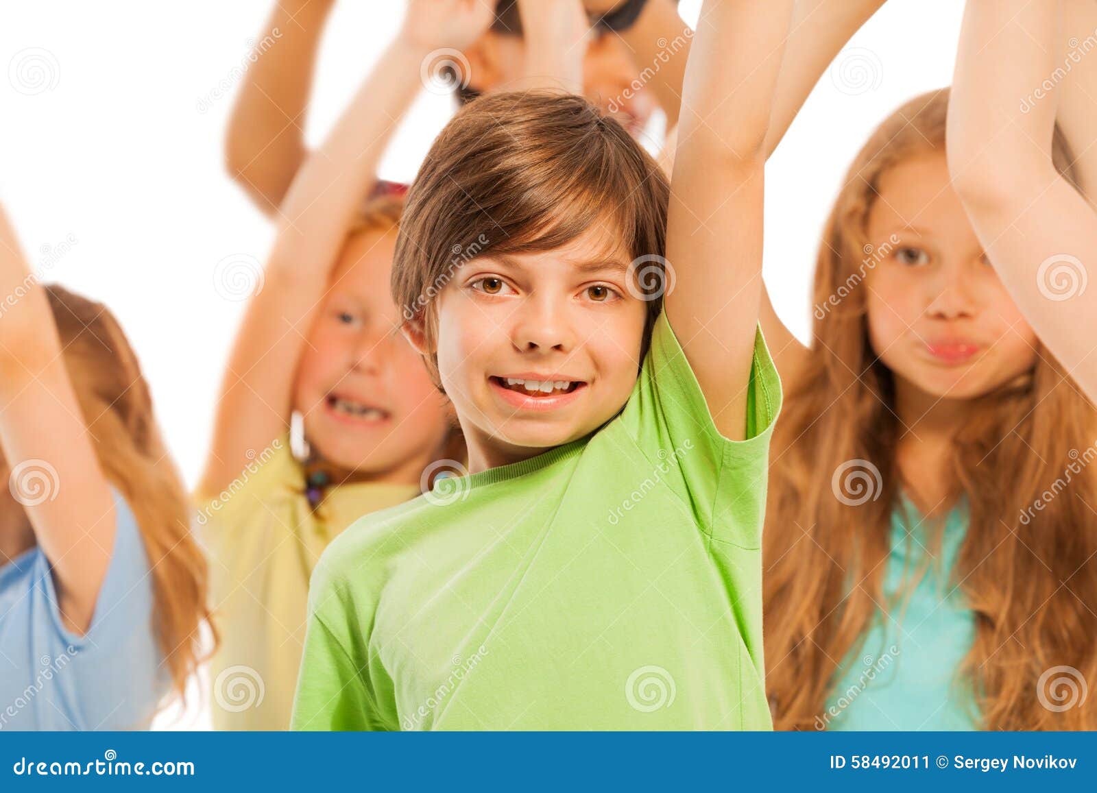 Kids cheering in the crowd stock image. Image of group - 58492011