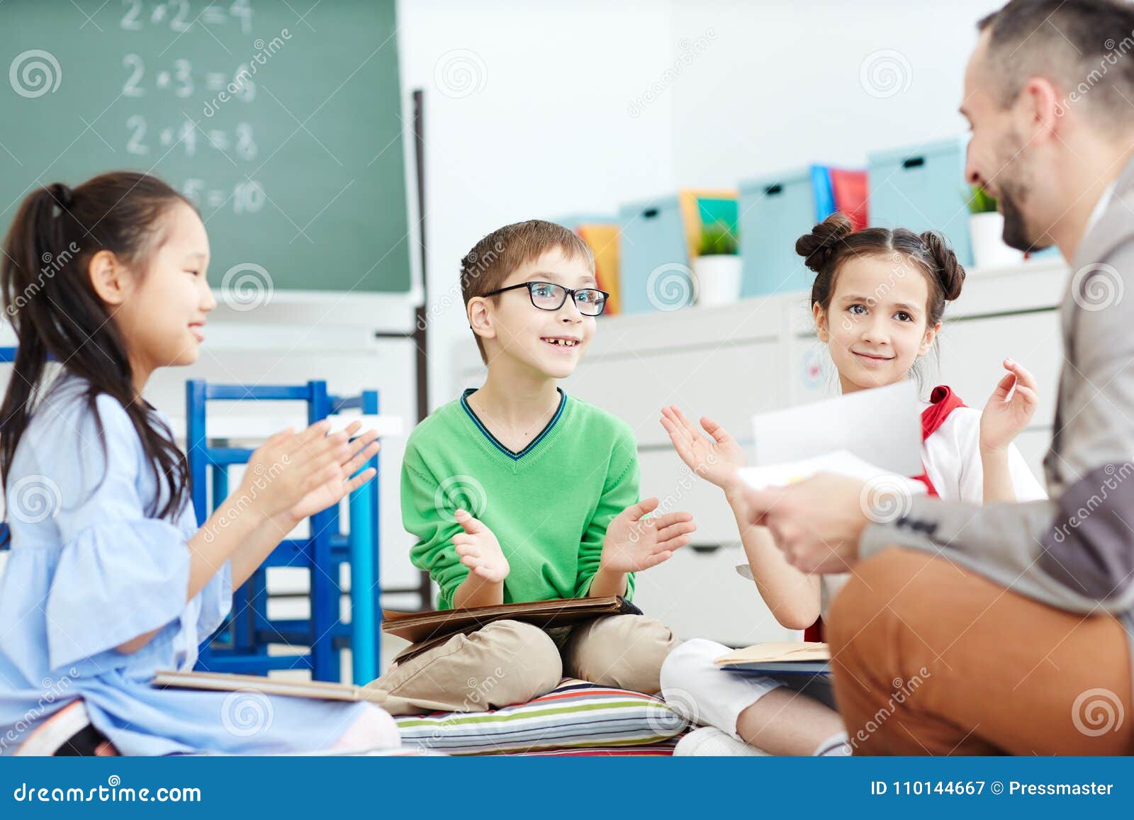 Kids clapping hands stock image. Image of altogether - 110144667
