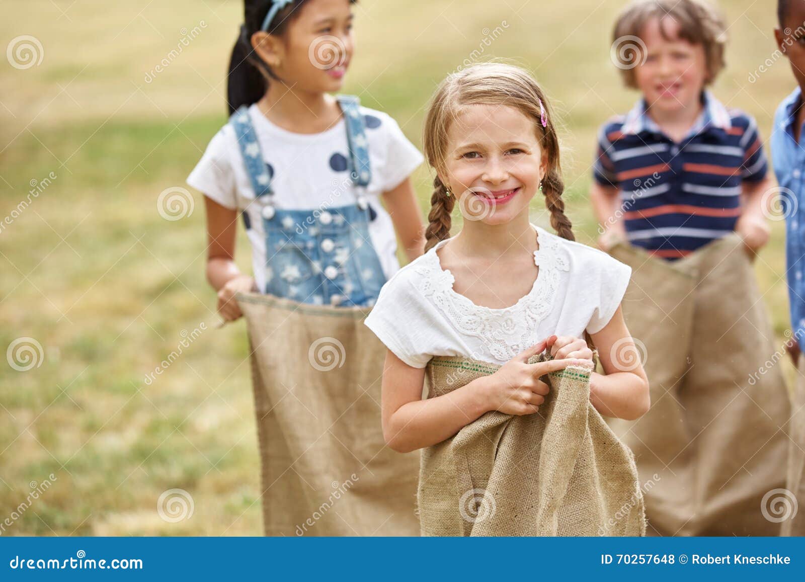 Kids Competing at Sack Race Stock Photo - Image of birthday ...