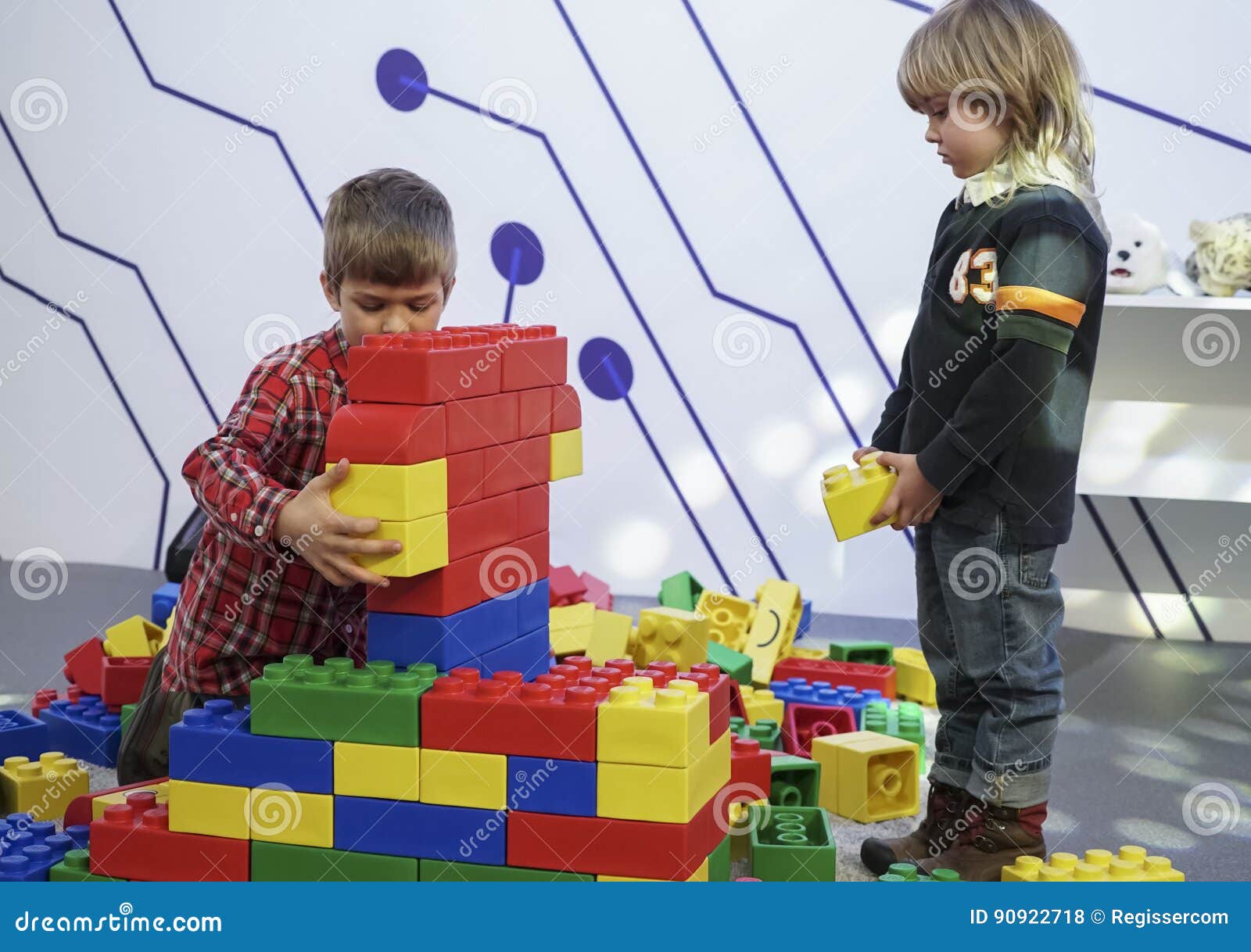 Kids Constructing a Man from the Building Blocks Stock Photo - Image of ...