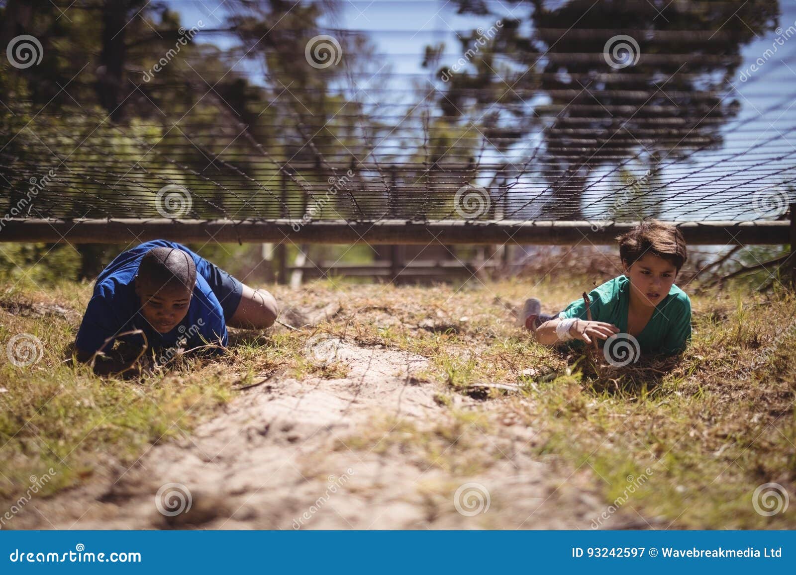 Kids Crawling Under the Net during Obstacle Course Stock Image - Image ...