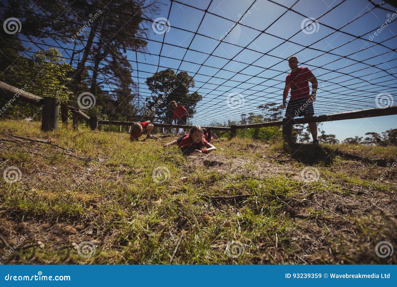 Kids Crawling Under the Net during Obstacle Course Training Stock Image ...