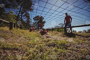 Kids Crawling Under the Net during Obstacle Course Training Stock Image ...