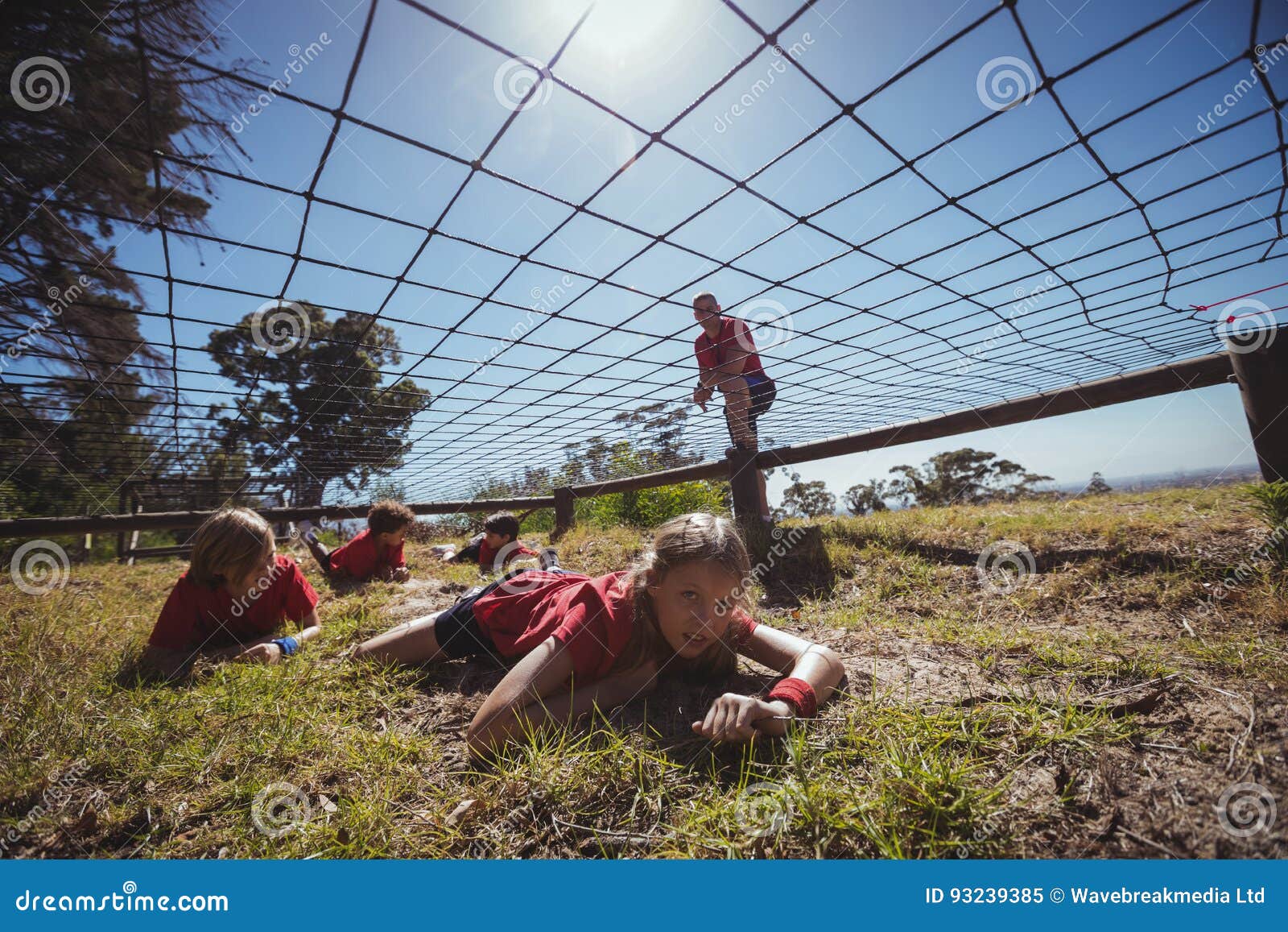 Kids Crawling Under the Net during Obstacle Course Training Stock Image ...