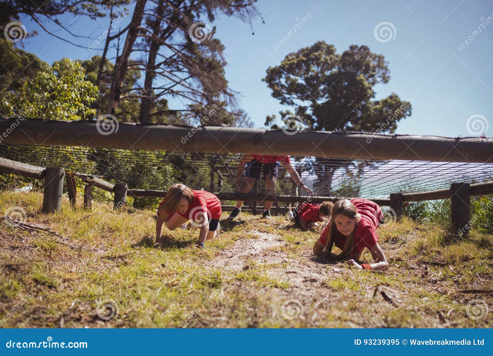 Kids Crawling Under the Net during Obstacle Course Training Stock Image ...