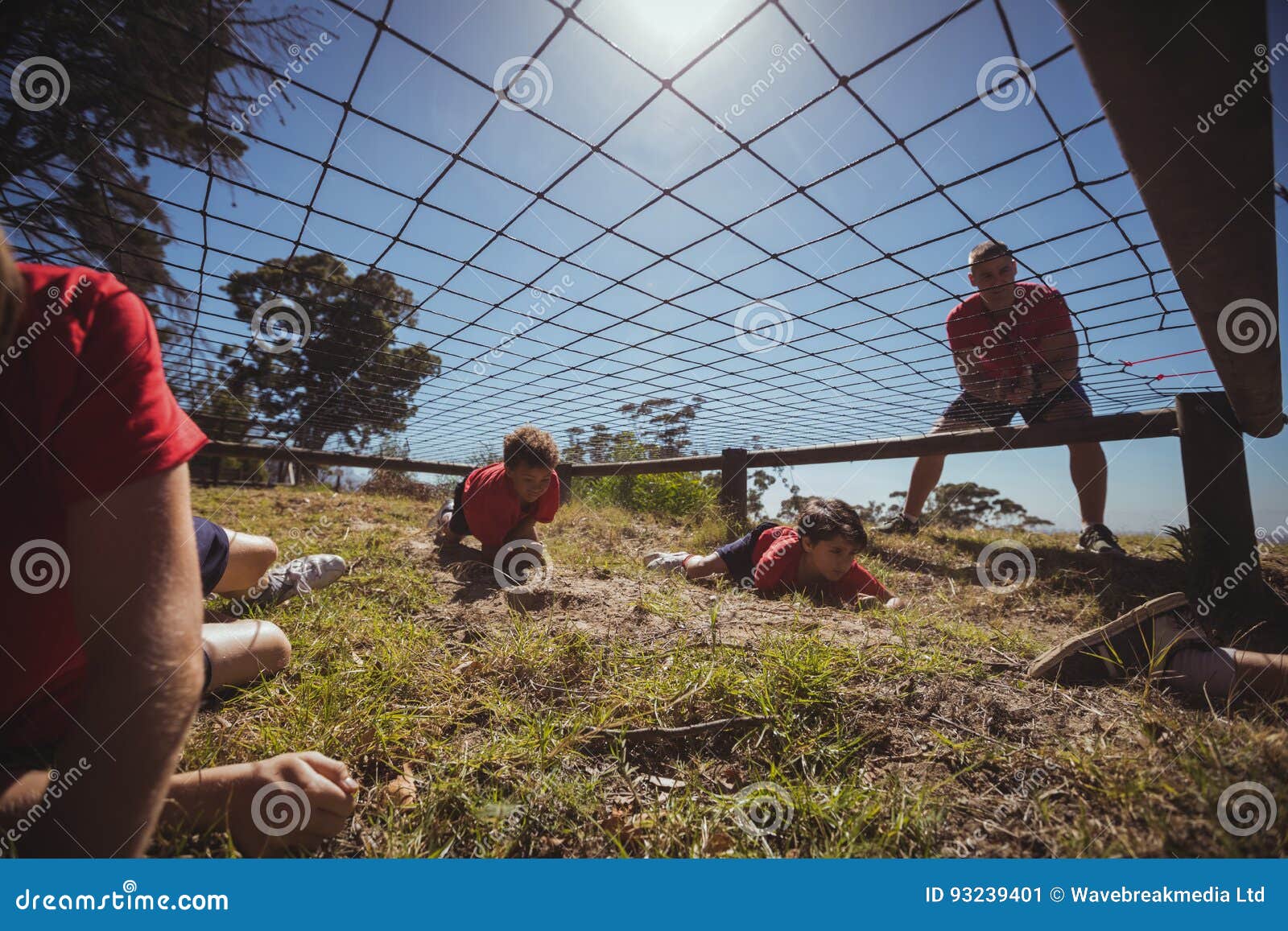 Kids Crawling Under the Net during Obstacle Course Training Stock Image ...