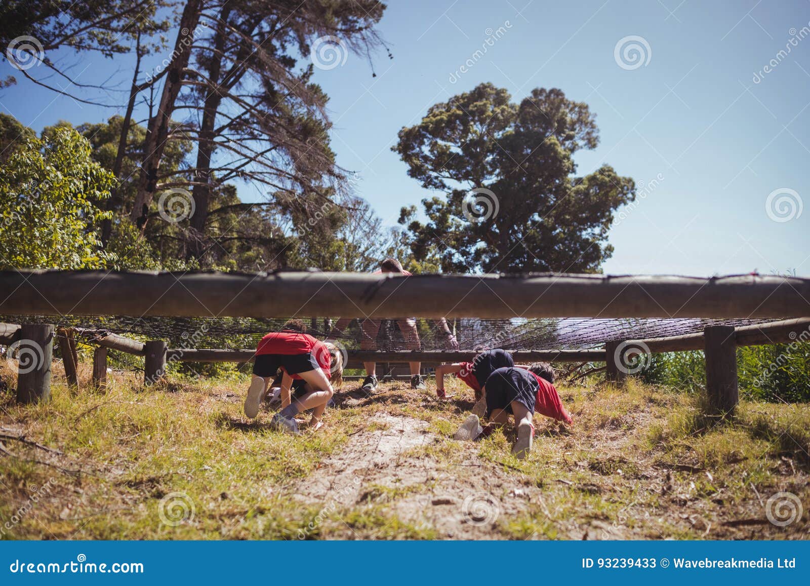 Kids Crawling Under the Net during Obstacle Course Training Stock Image ...