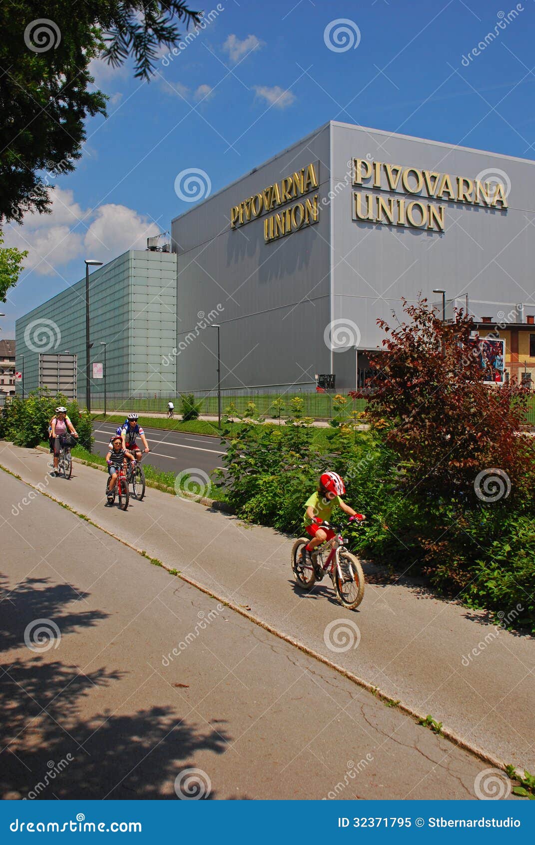 Kids Cycling Down the Road editorial image. Image of kids - 32371795