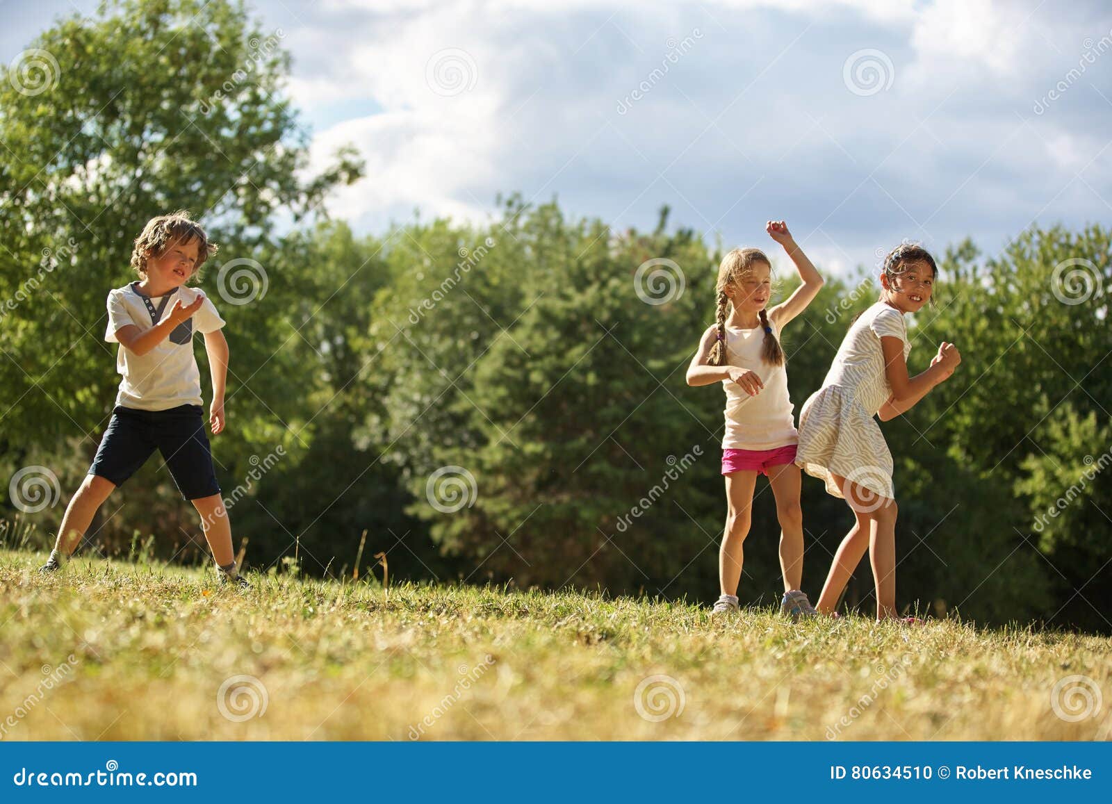 Kids dancing in summer stock photo. Image of community - 80634510