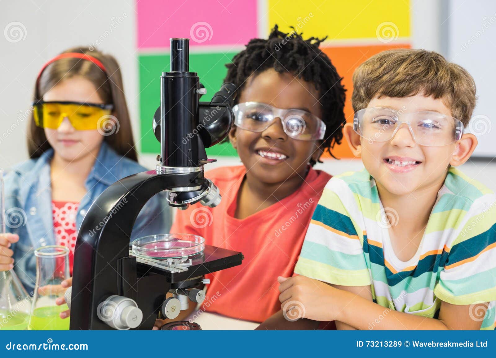 Kids Doing Experiment on Microscope in Laboratory Stock Image - Image ...