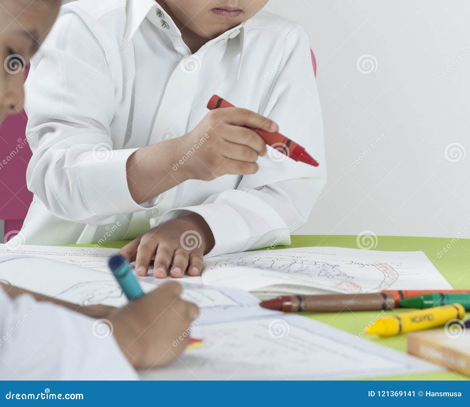 Kids Drawing With Colored Crayons At A Table Editorial Image ...