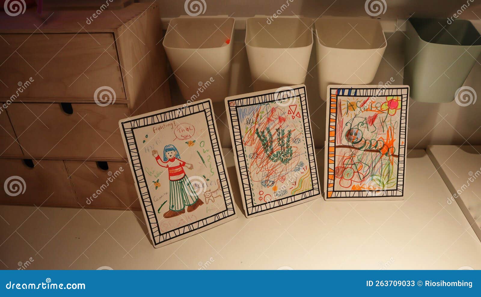 Kids Drawing Picture, Some Container and Drawer at the Table Stock ...