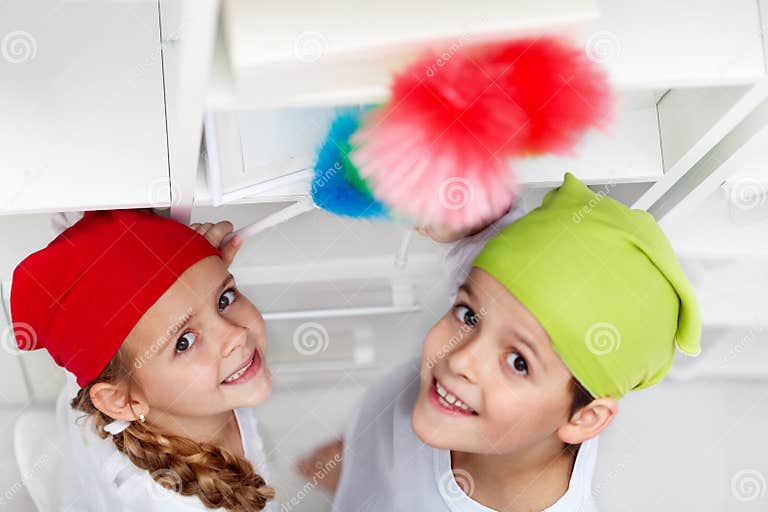 Kids dusting in their room stock photo. Image of holding - 23003328