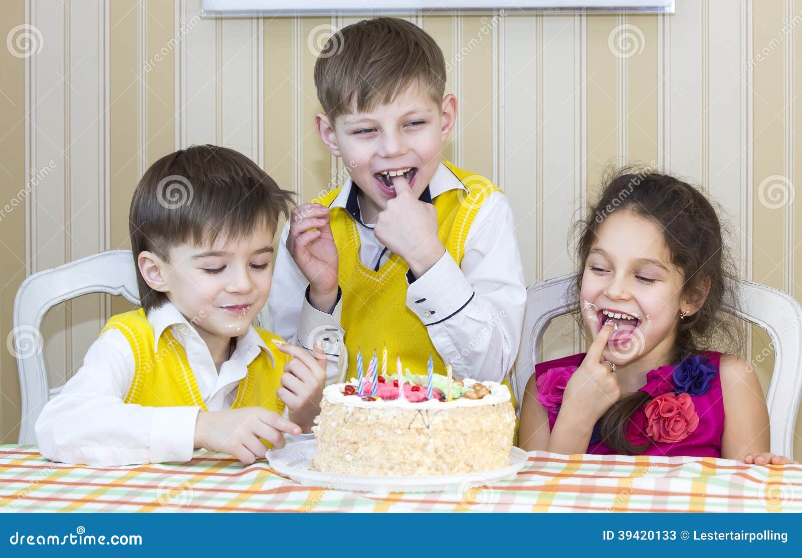 Kids eat cake stock image. Image of meadow, group, childhood - 39420133