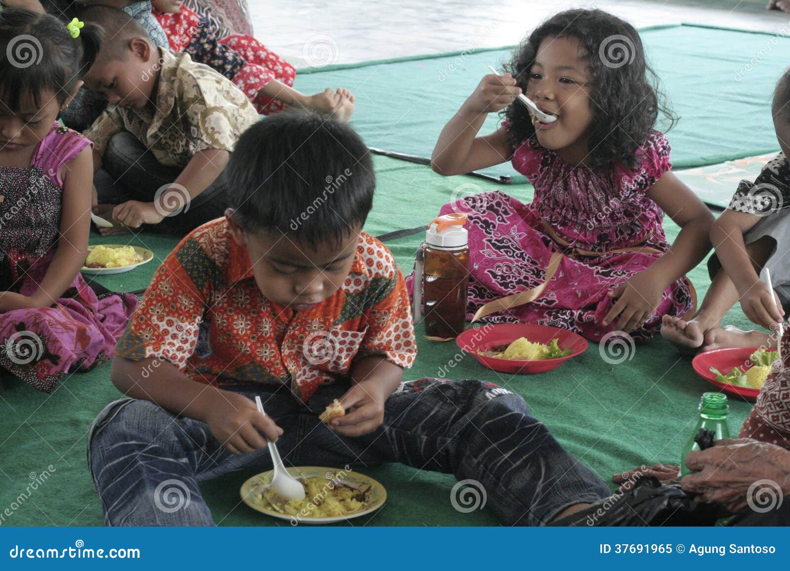 KIDS EAT RICE CELEBRATION DAY PRESS Editorial Image - Image of excited ...
