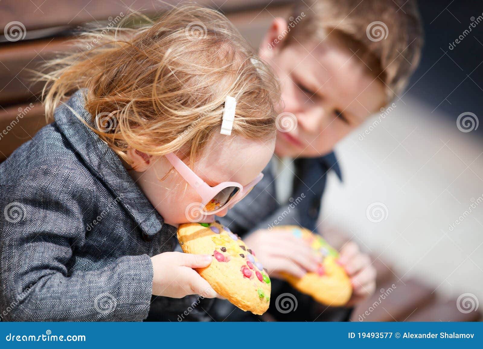Kids eating cookie stock image. Image of girl, adorable - 19493577