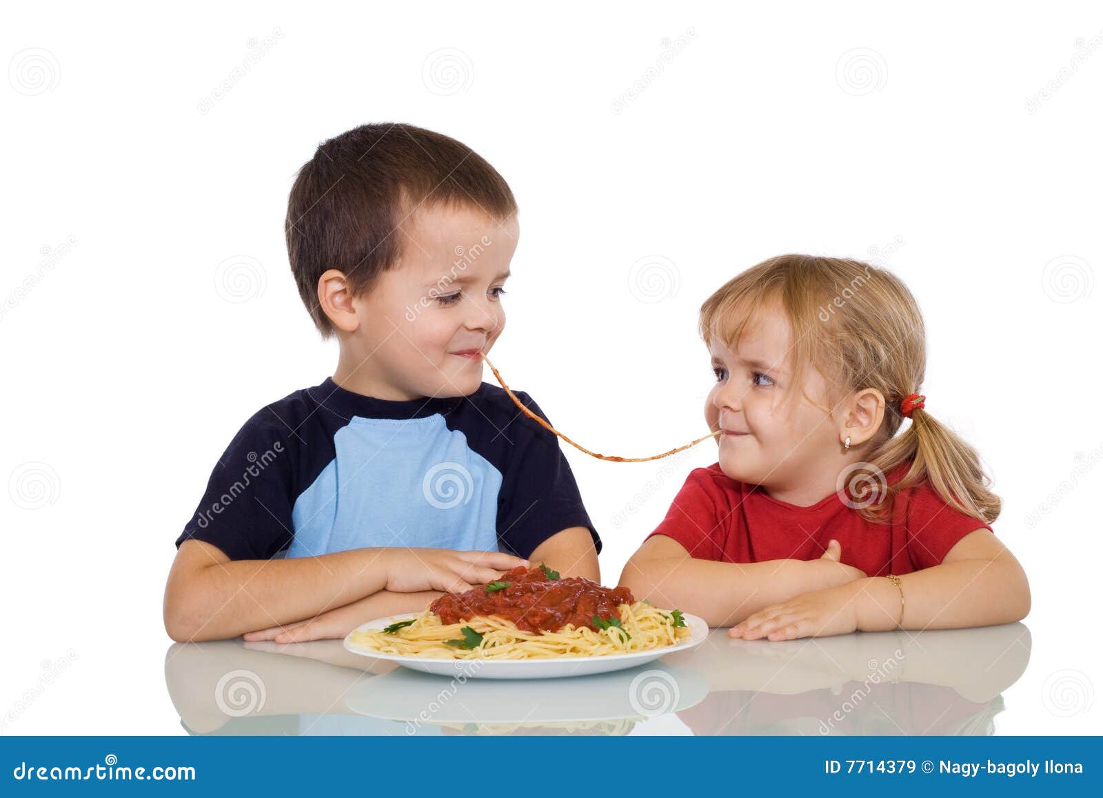 Kids eating pasta stock image. Image of string, hungry - 7714379