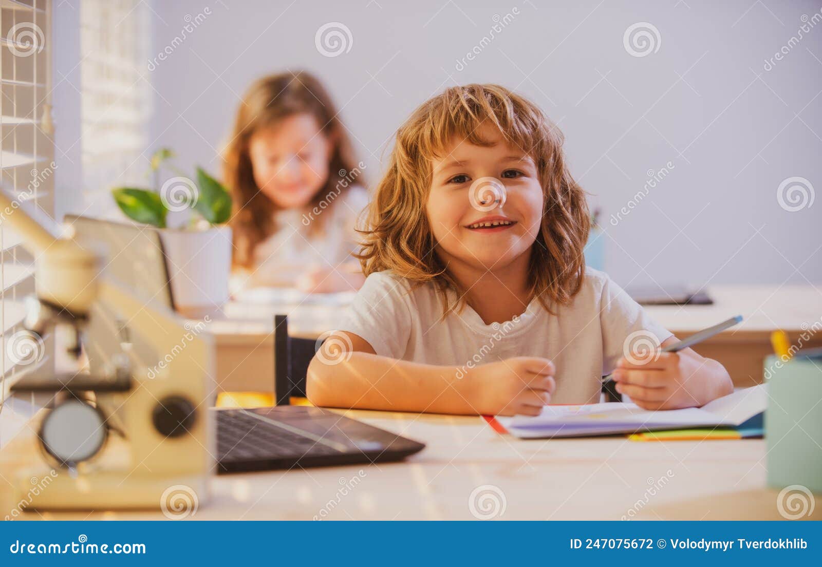 Kids Education and Study Concept. Primary School Student in Classroom ...