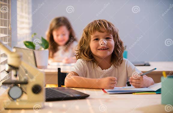 Kids Education and Study Concept. Primary School Student in Classroom ...