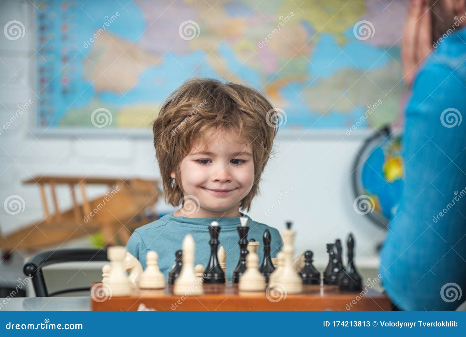 Kids Educational Games, Early Development. Boy Kid Playing Chess At ...