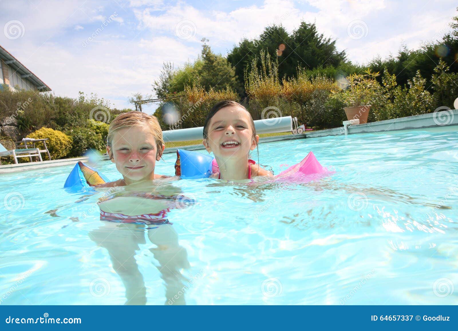 Kids Enjoying Swimming Pool Stock Image - Image of smile, kids: 64657337