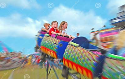 Kids on Fair Ride stock photo. Image of friends, fair - 5114674
