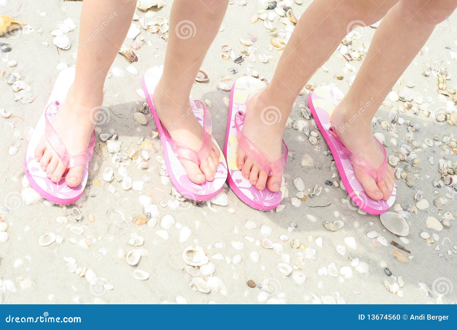 Kids feet at the beach stock photo. Image of shells, floating - 13674560