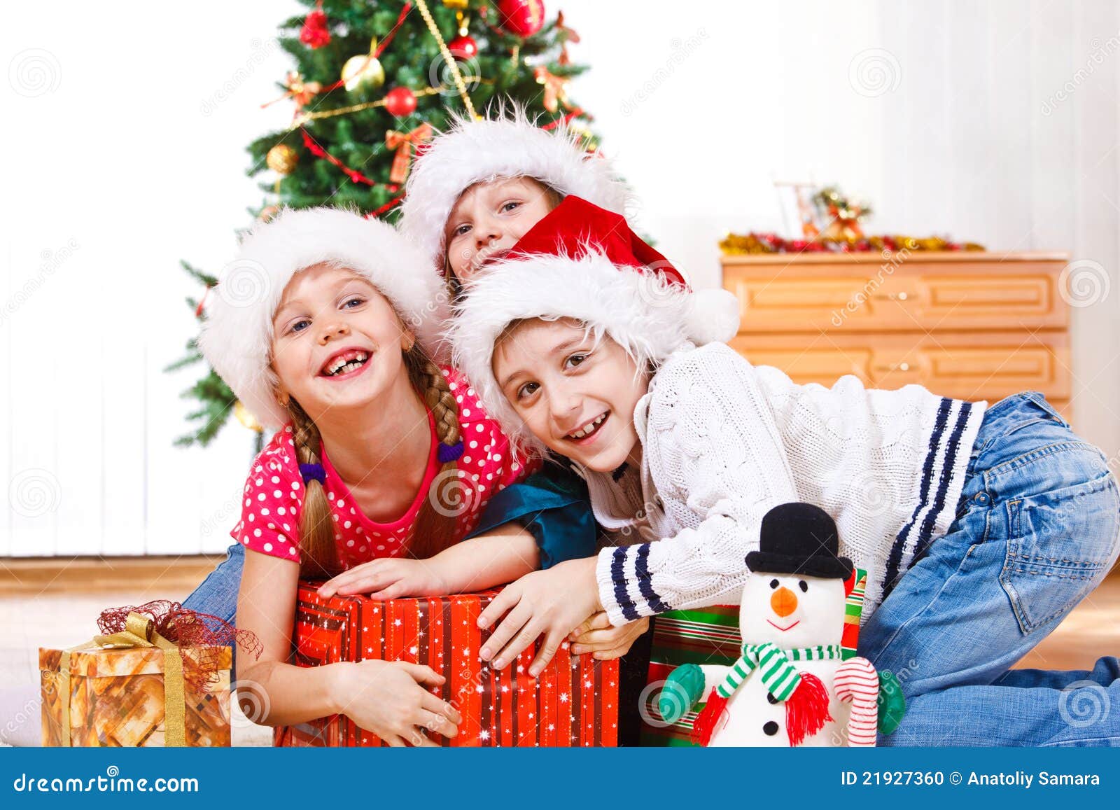 Kids fighting for presents stock photo. Image of gifts - 21927360