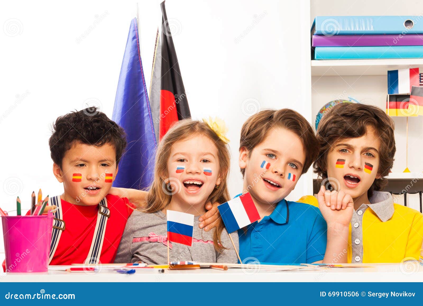 Kids with Flags on Cheeks Singing at the Classroom Stock Photo - Image ...
