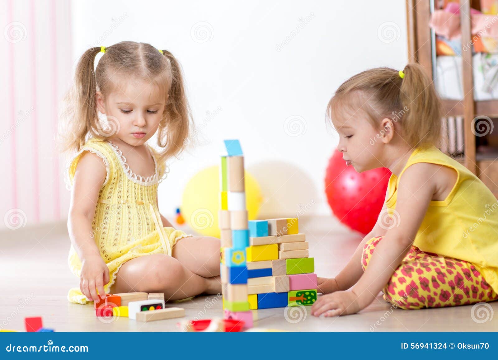 Kids girls playing at home stock photo. Image of friend - 56941324