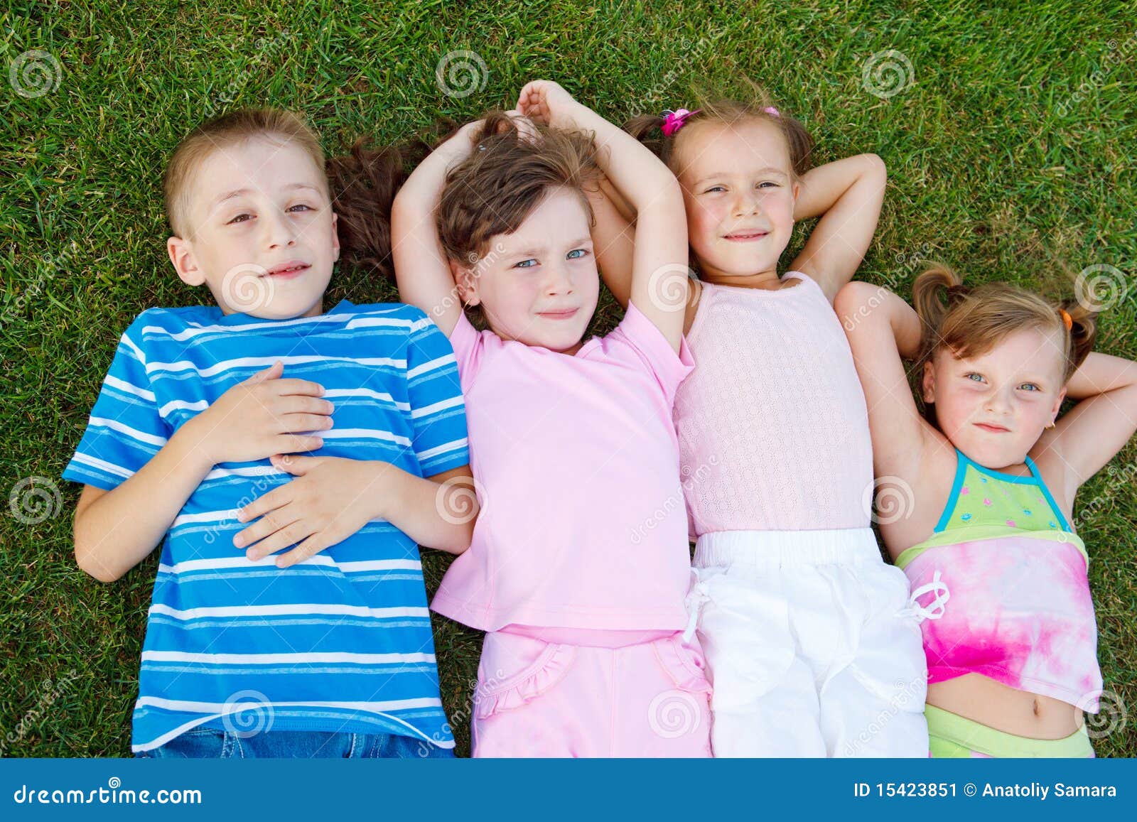 Kids on grass stock image. Image of grass, girl, boys - 15423851