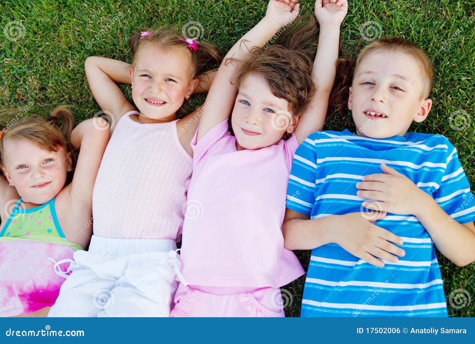 Kids on grass stock photo. Image of childhood, friends - 17502006