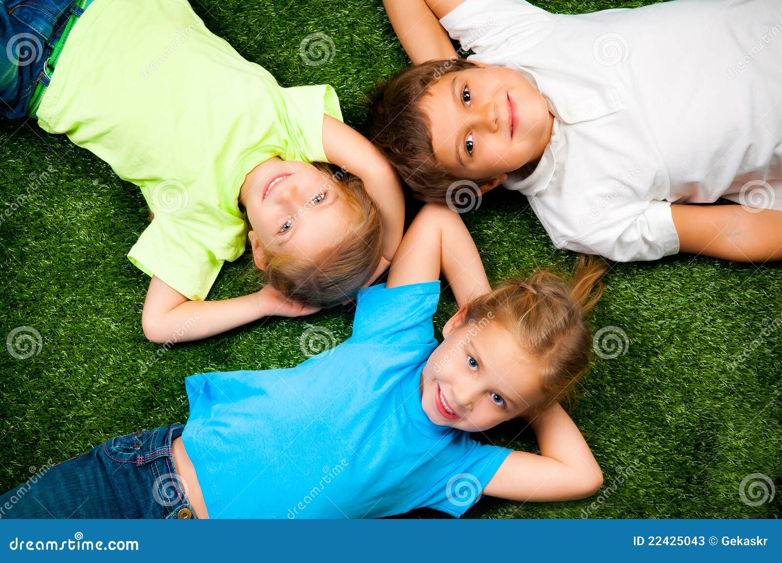 Kids on grass stock image. Image of field, lawn, beautiful - 22425043