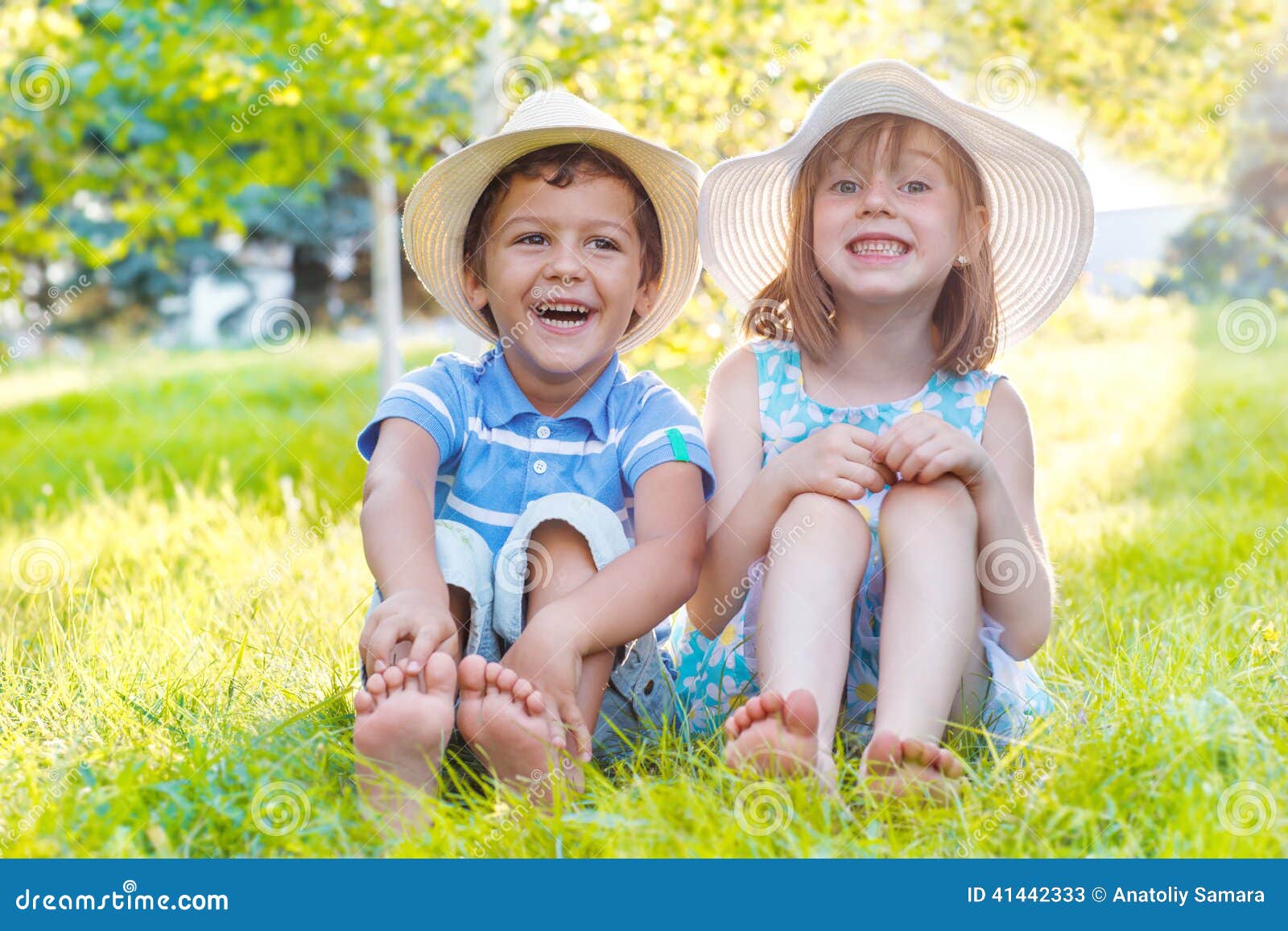 Kids on green grass stock image. Image of green, environmental - 41442333