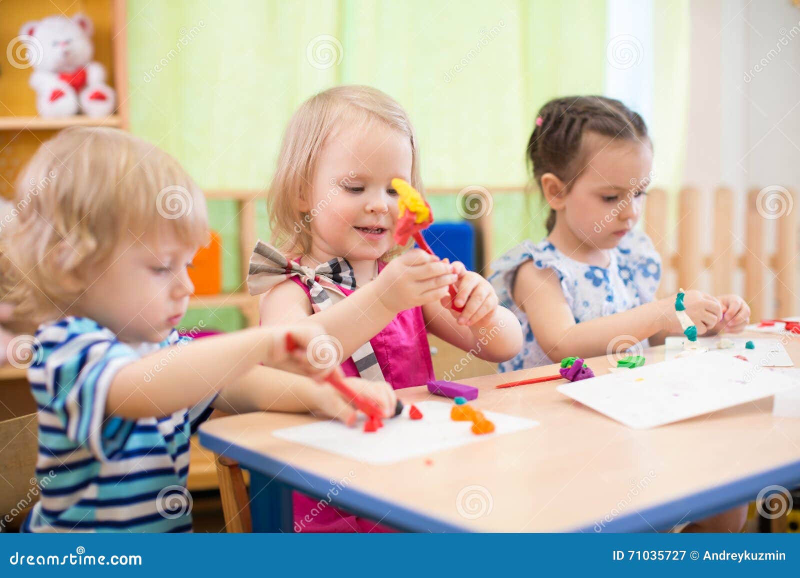Kids Group Making Arts and Crafts in Kindergarten with Interest Stock ...