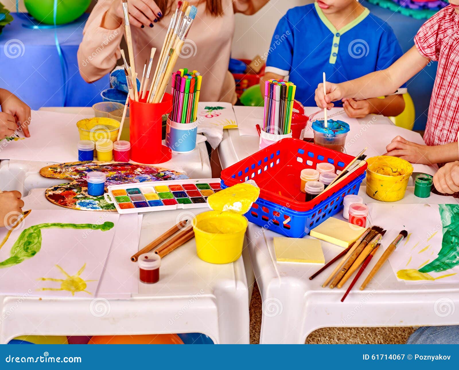 Kids Hands Holding Colored Paper and Glue on Table Stock Image - Image ...