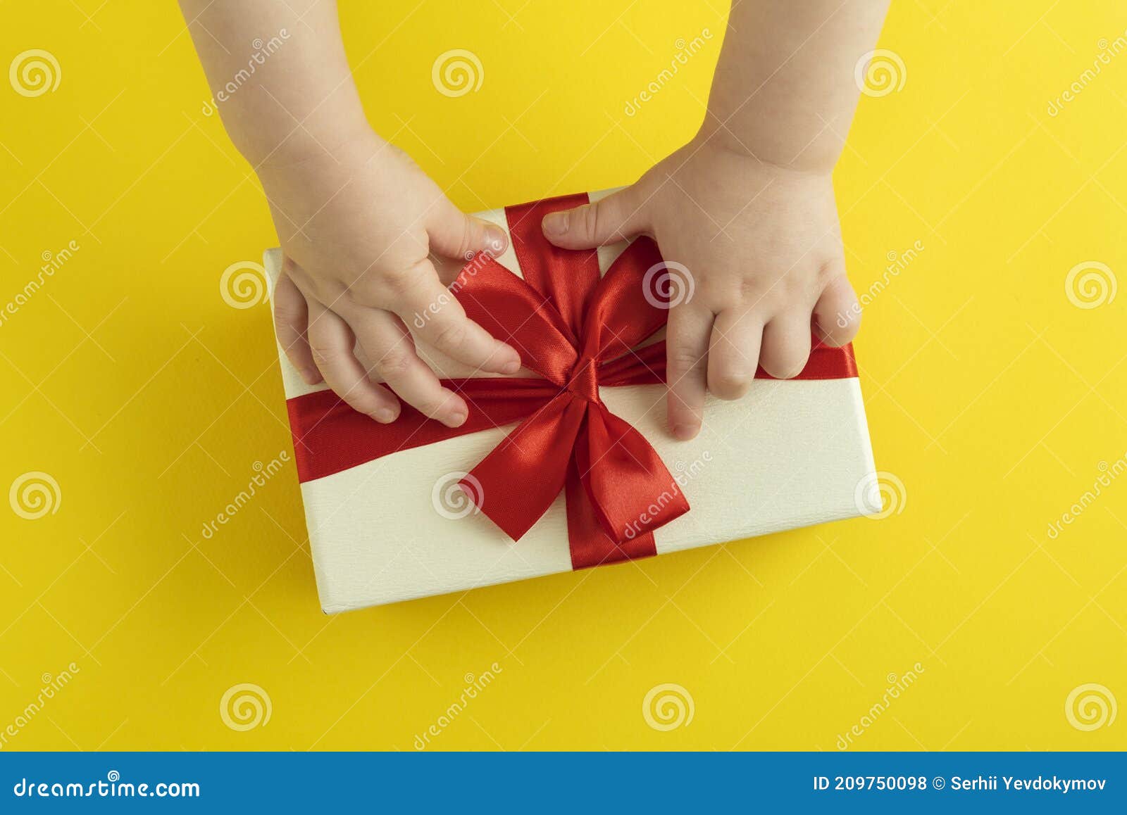 Kids Hands Untie the Bow on Gift Box. Top View Stock Photo - Image of ...