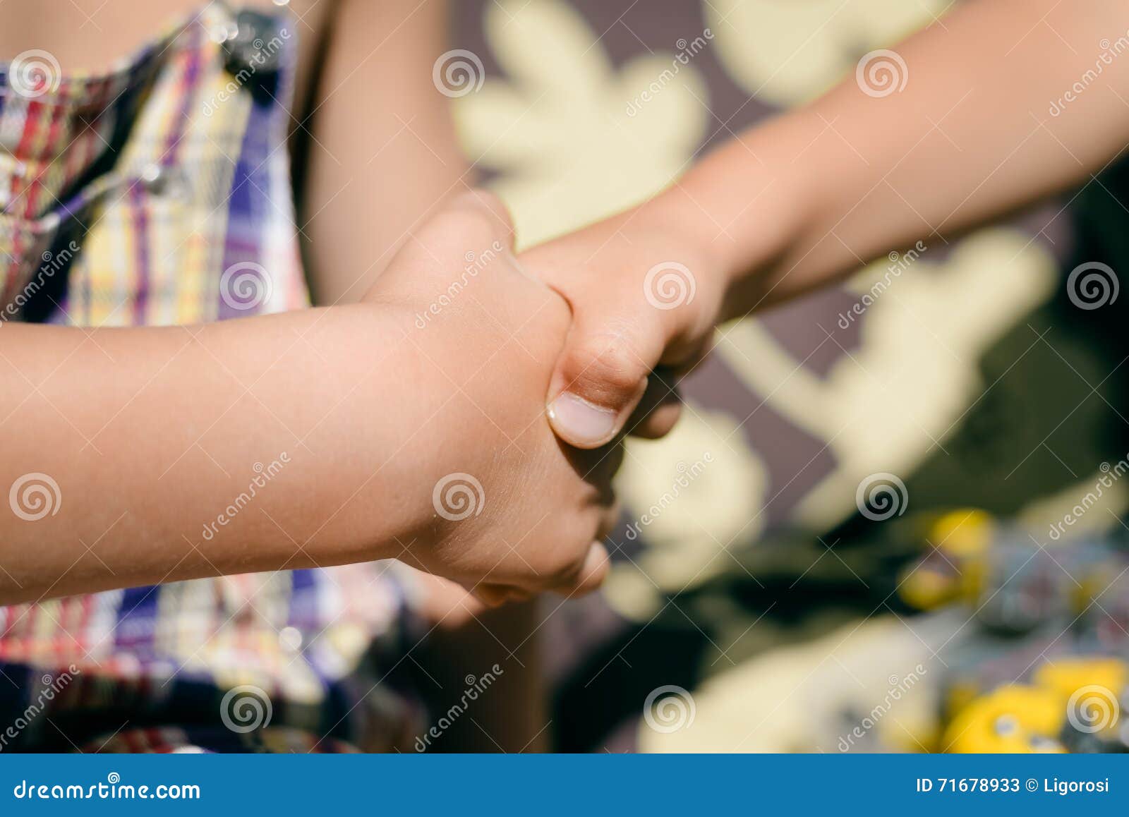 Kids Handshake Closeup on Sunny Outdoors Background Stock Image - Image ...