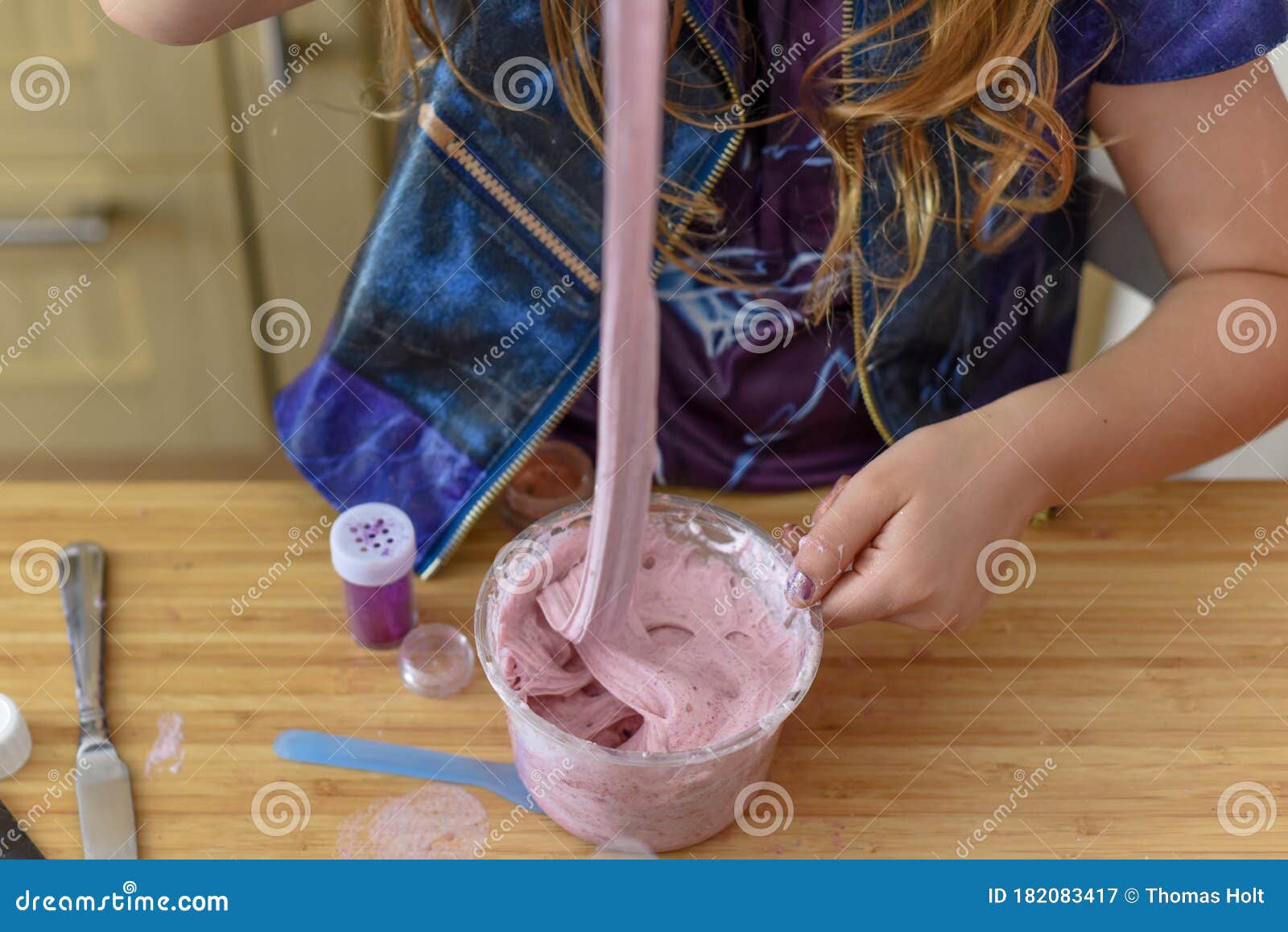 Kids Have Fun Learning at Home Making Slime in a Creative Science ...