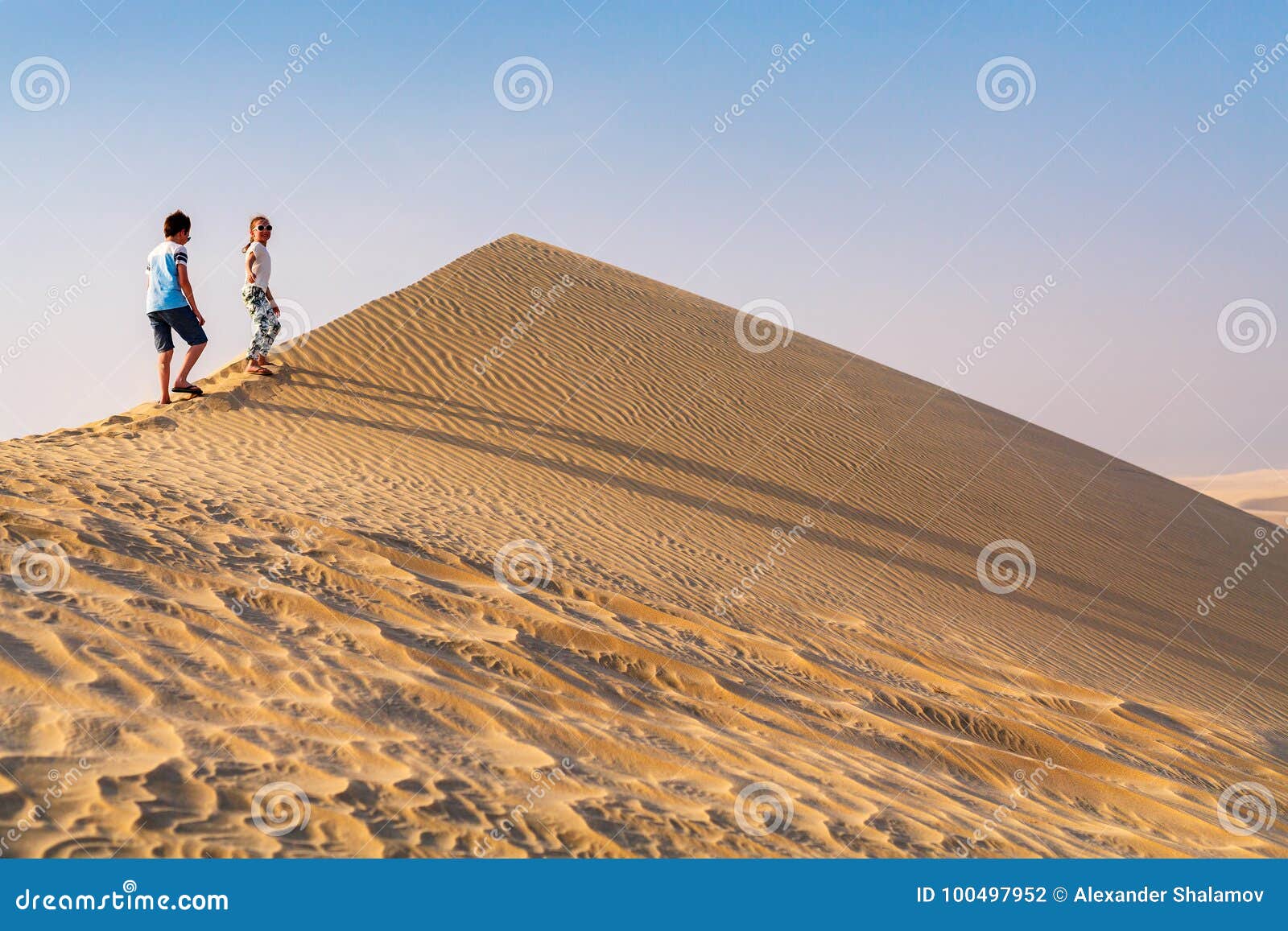 Kids having fun at desert stock photo. Image of happiness - 100497952