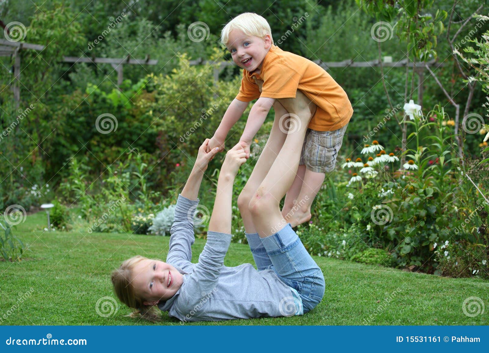 Kids Having Fun in the Garden Stock Image - Image of garden, green ...
