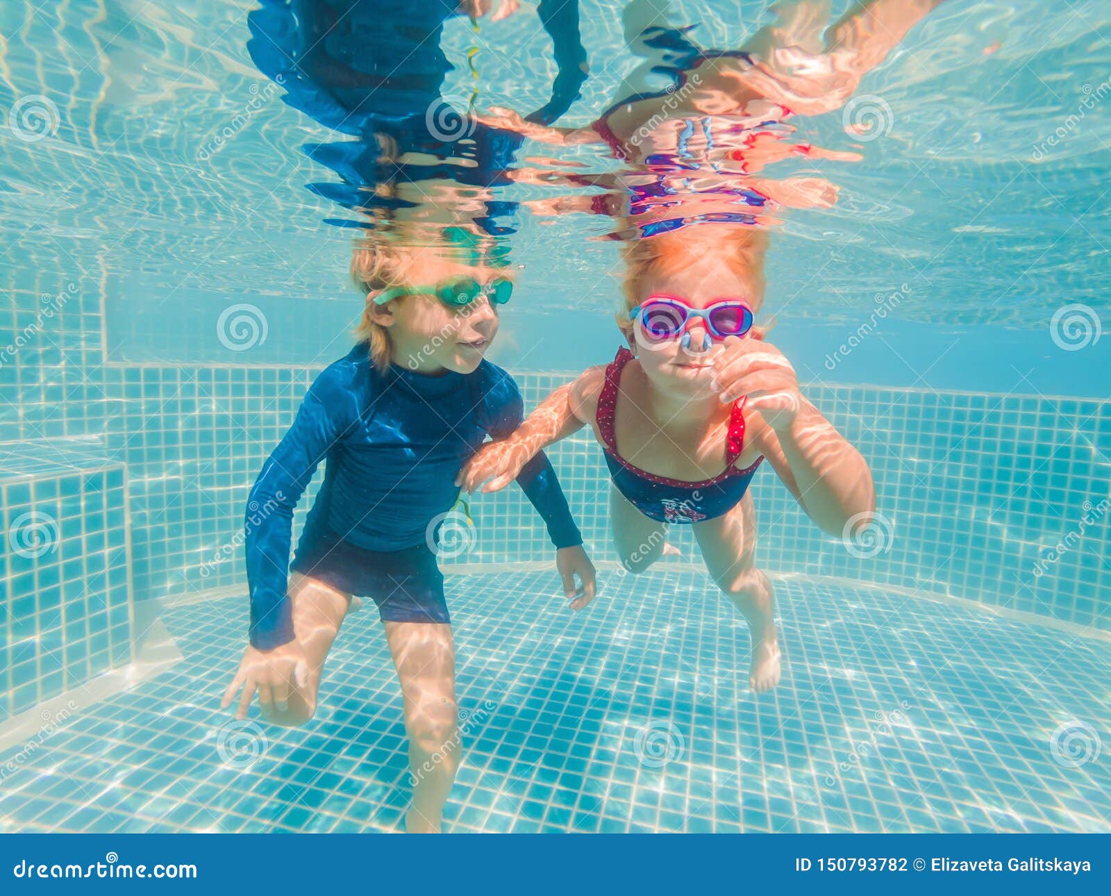 Kids Having Fun Playing Underwater in Swimming Pool on Summer Vacation ...