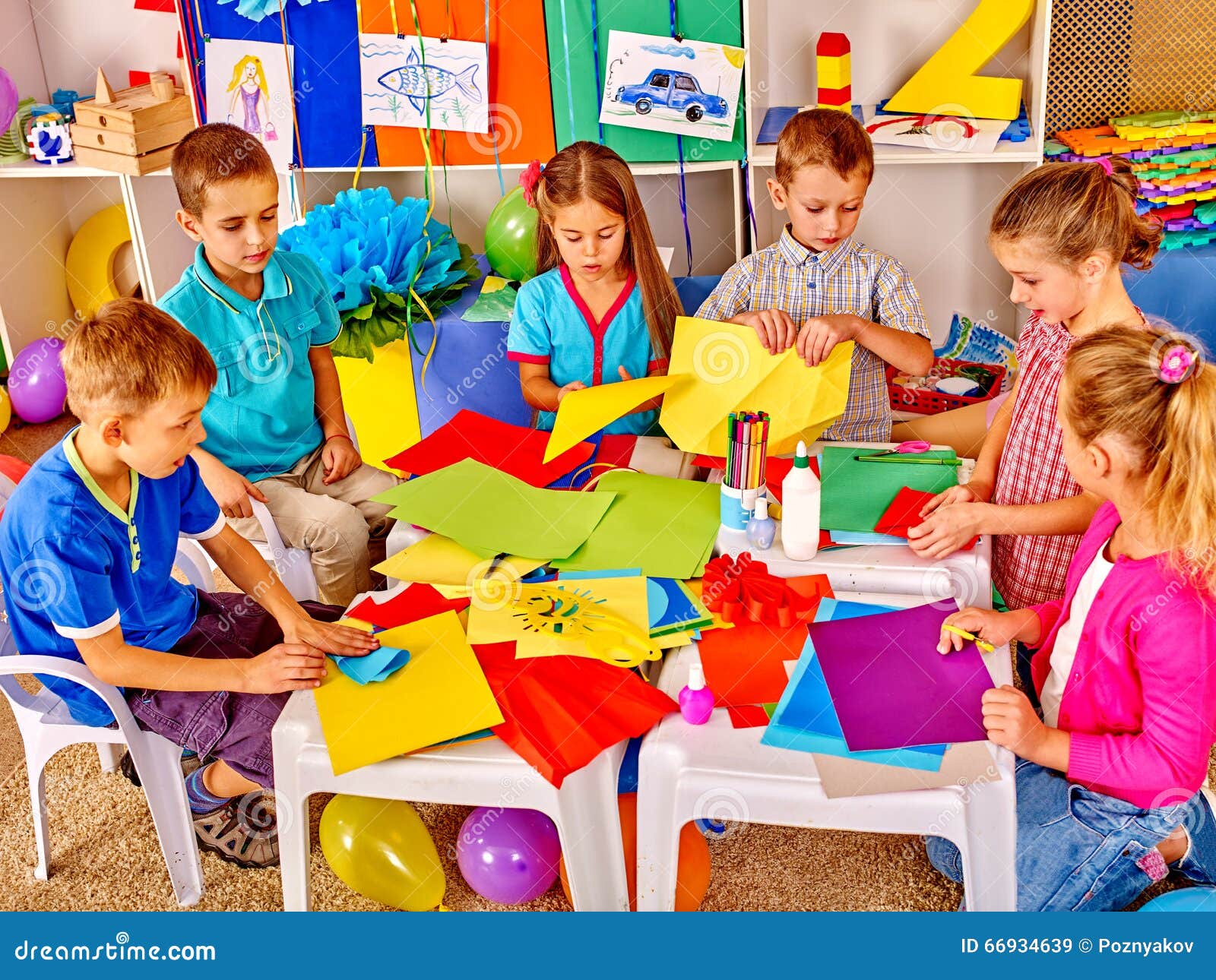 Kids Holding Colored Paper on Craft Lesson in Kindergarten . Stock ...