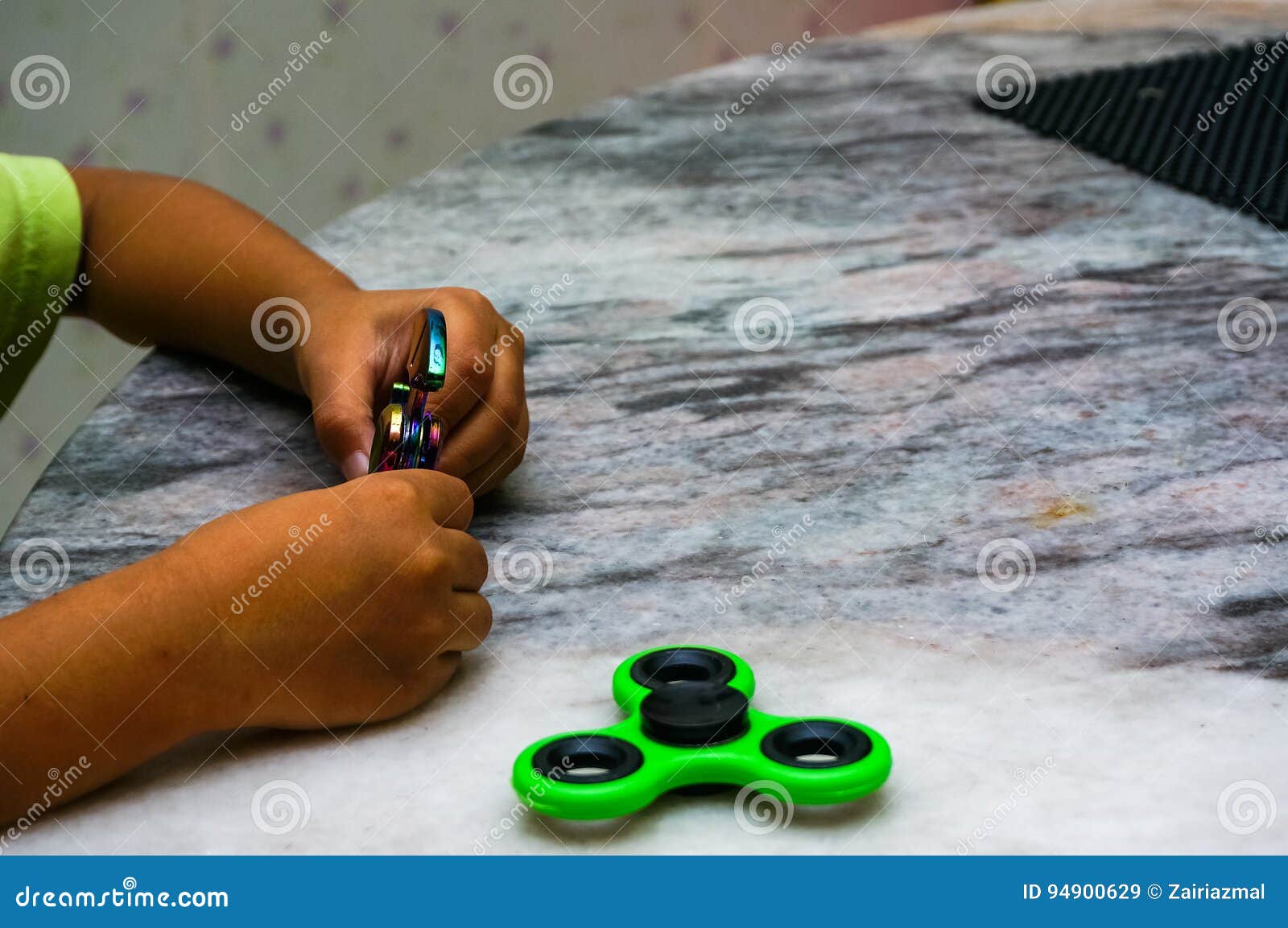 Kids Holding Fidget Spinner Stock Image - Image of bearing, fashionable ...