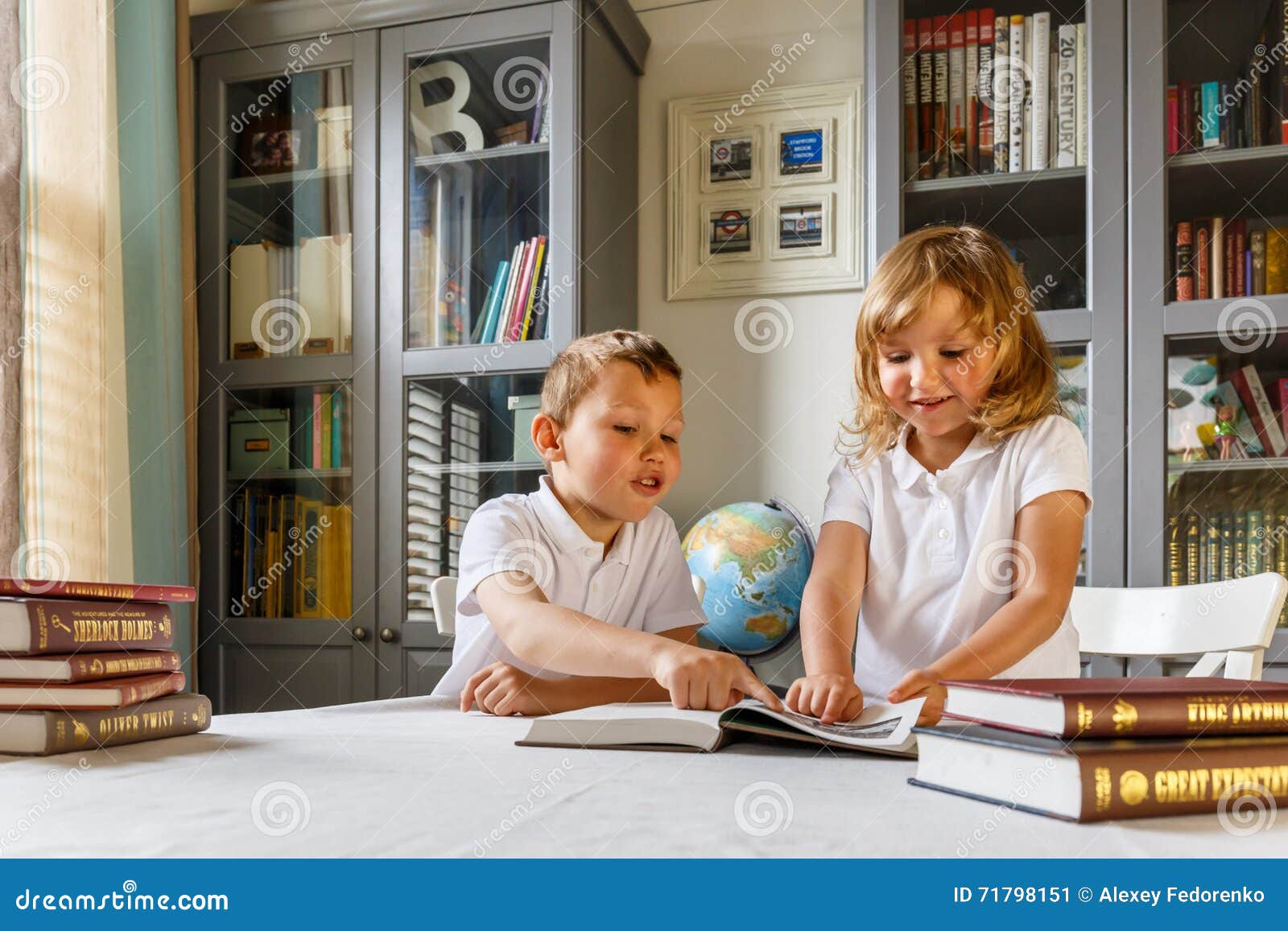 Kids at homework stock image. Image of geotagged, england - 71798151