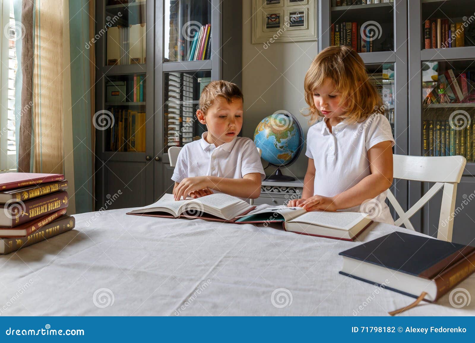 Kids at homework stock photo. Image of england, golden - 71798182