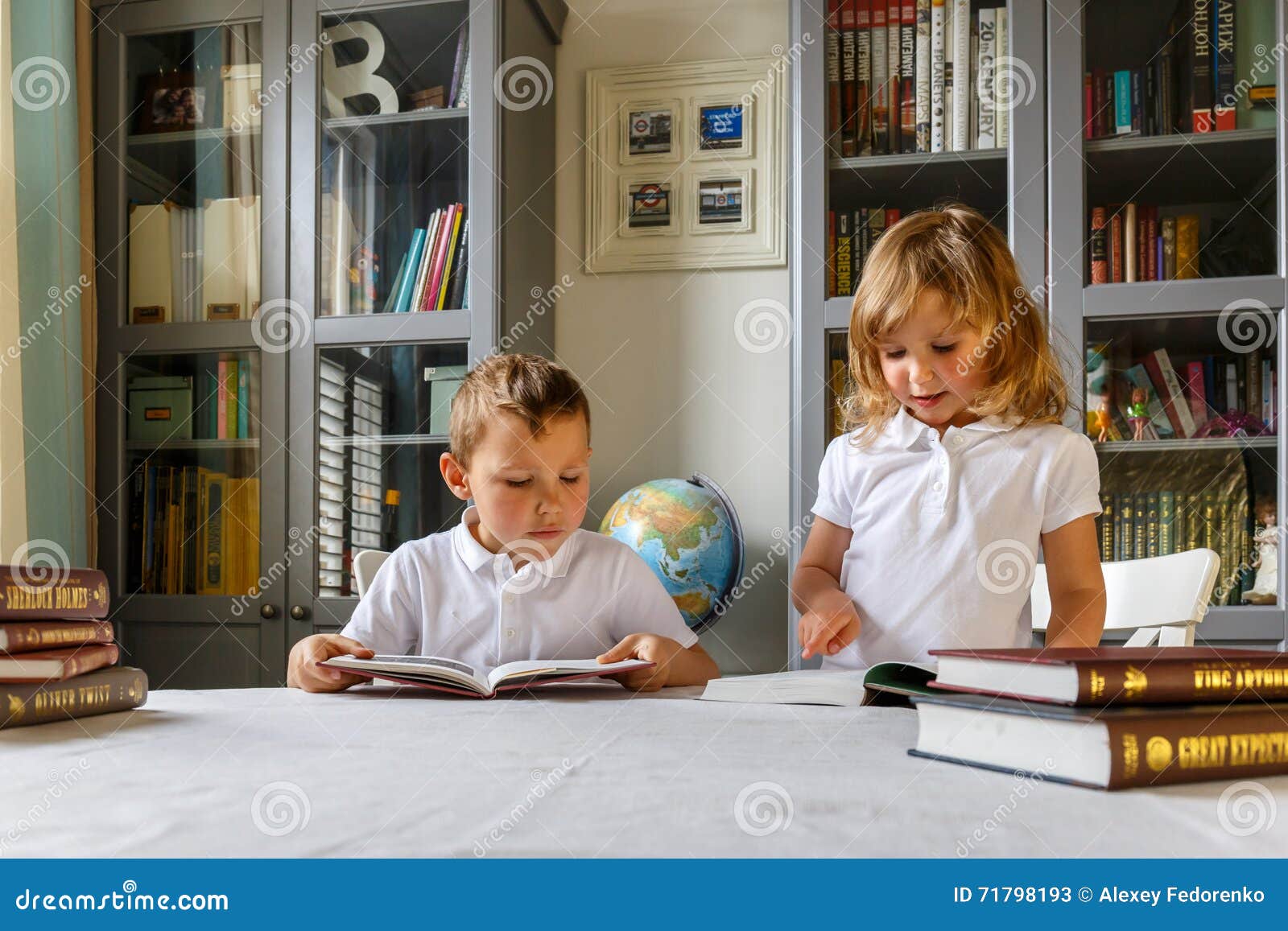 Kids at homework stock image. Image of globe, childhood - 71798193