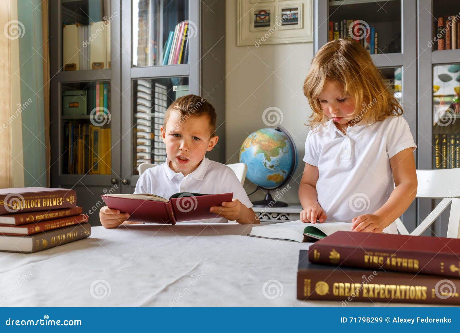 Kids at homework stock image. Image of english, cute - 71798299
