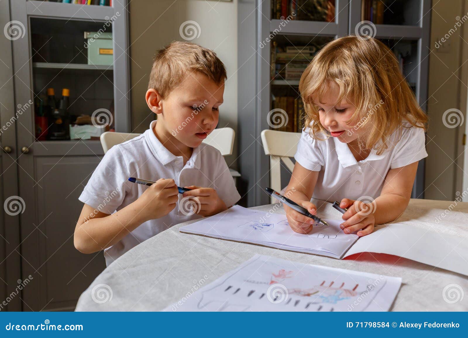 Kids at homework stock photo. Image of english, geotagged - 71798584