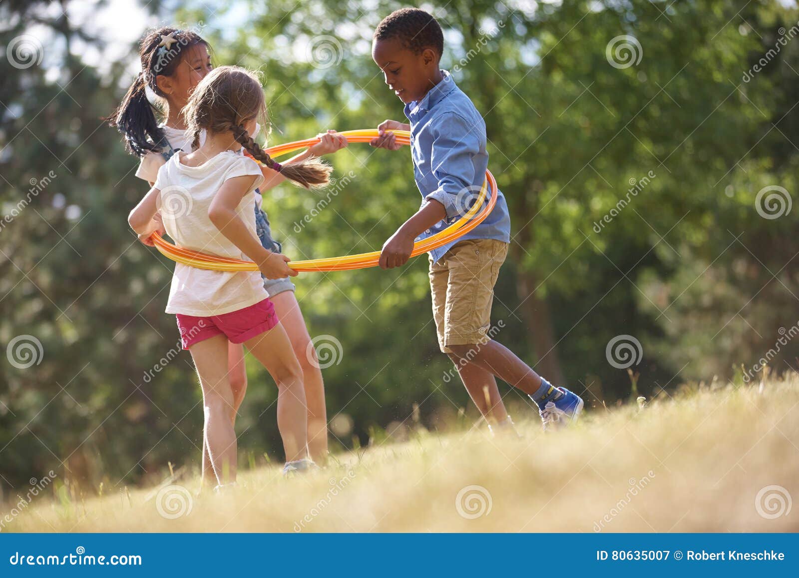 Kids with hula hoop stock image. Image of round, africans - 80635007